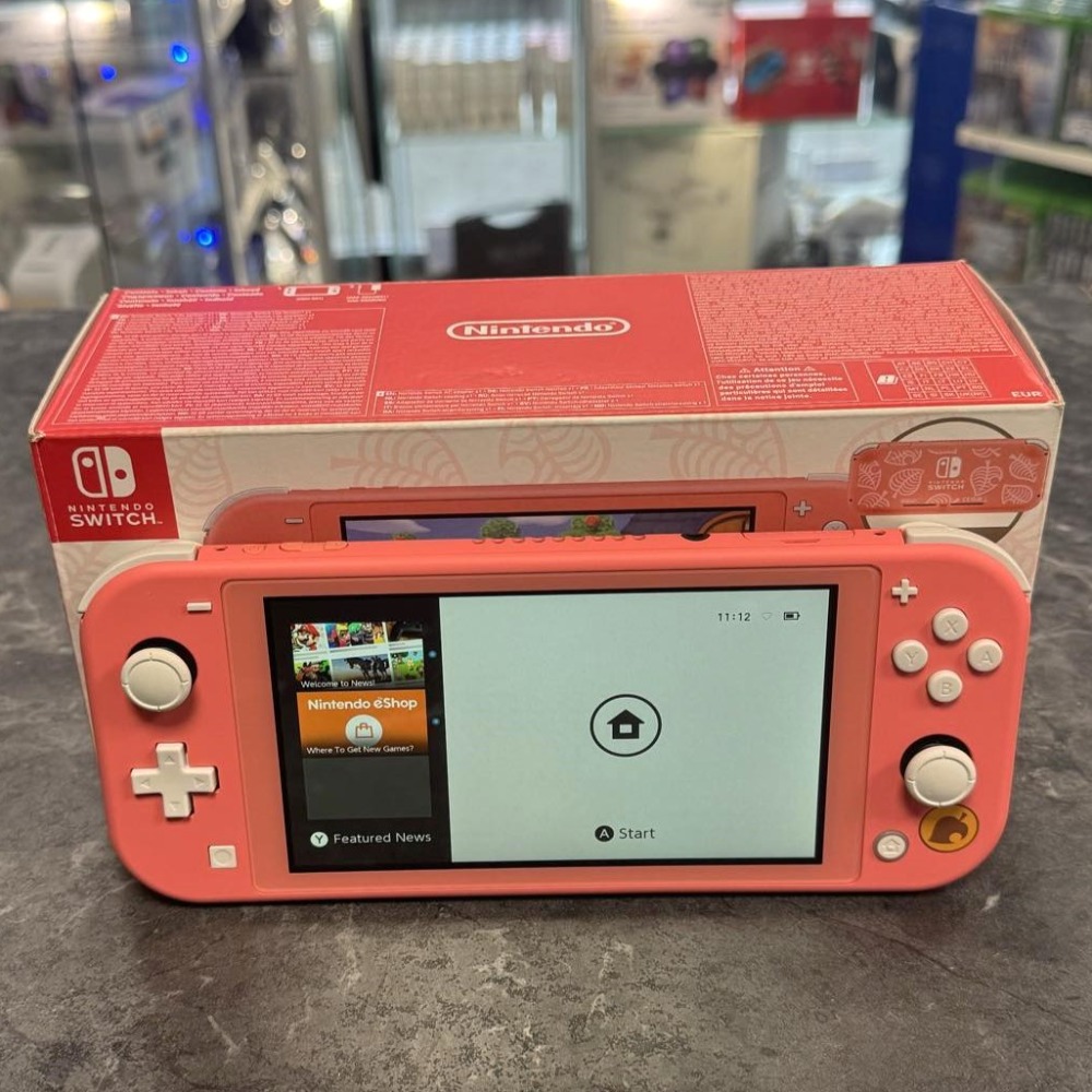 Nintendo Switch Lite - Coral Pink Handheld Gaming System - Own4Less